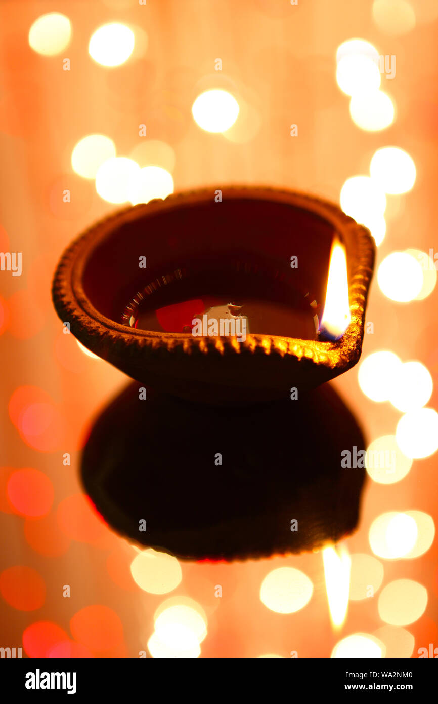Diwali diya burning Stock Photo - Alamy