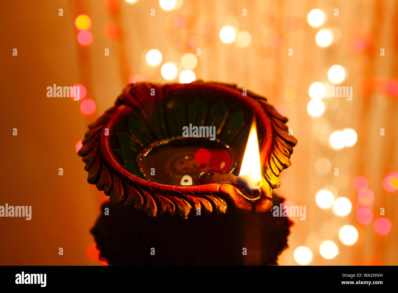 Diwali diya burning Stock Photo - Alamy