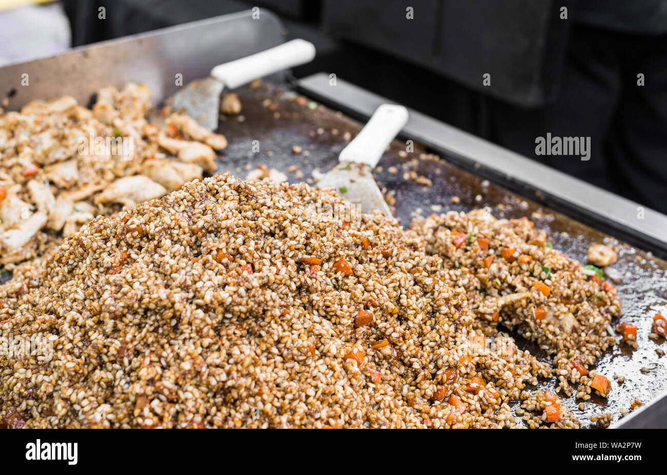 Bulgur durum wheat with vegetables and soy sauce at a street food ...