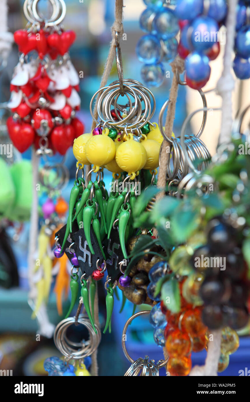 Close up of key rings at a market stall Stock Photo - Alamy