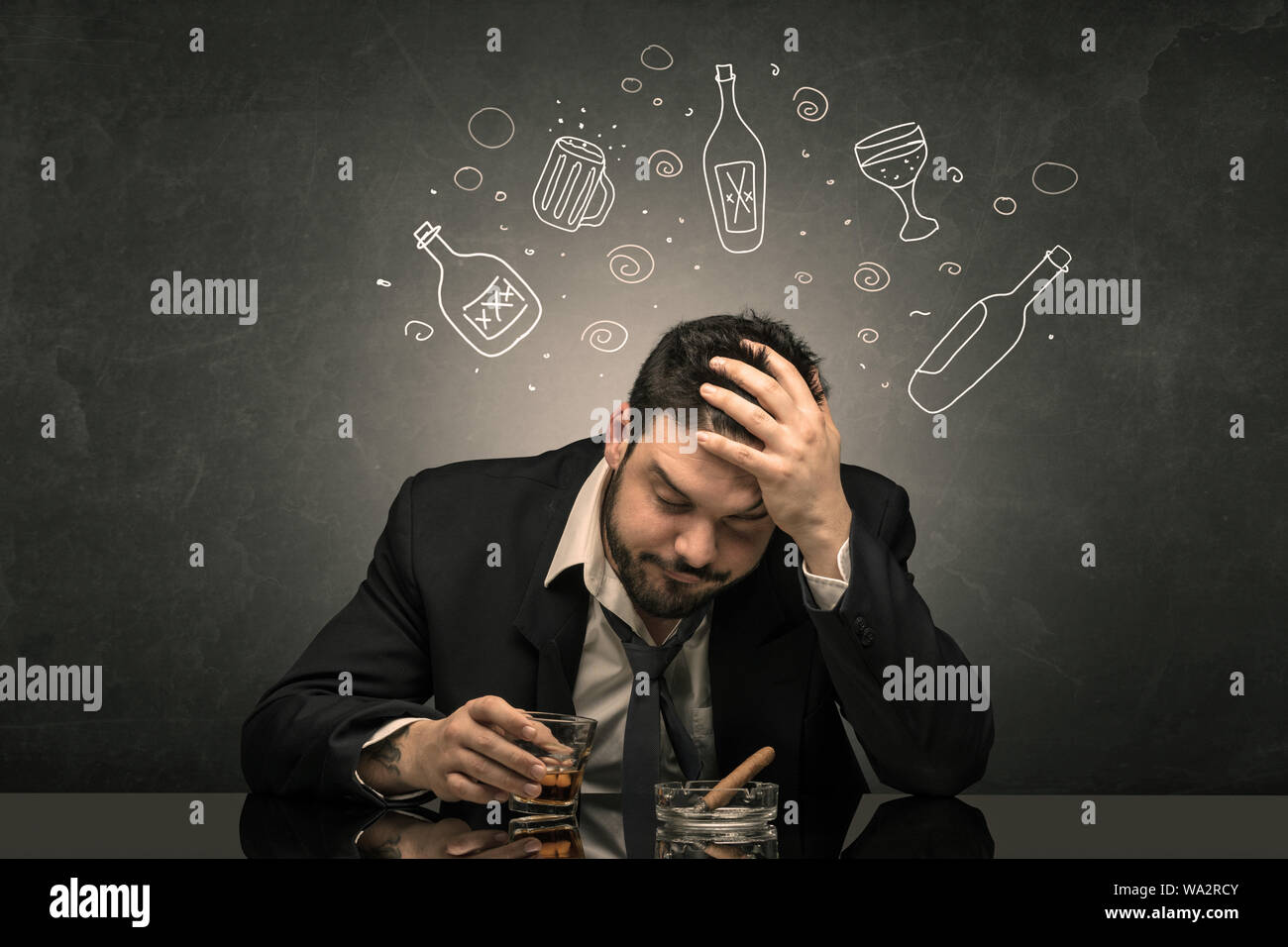 Drunk down and out man with doodle alcohol bottles concept Stock Photo ...