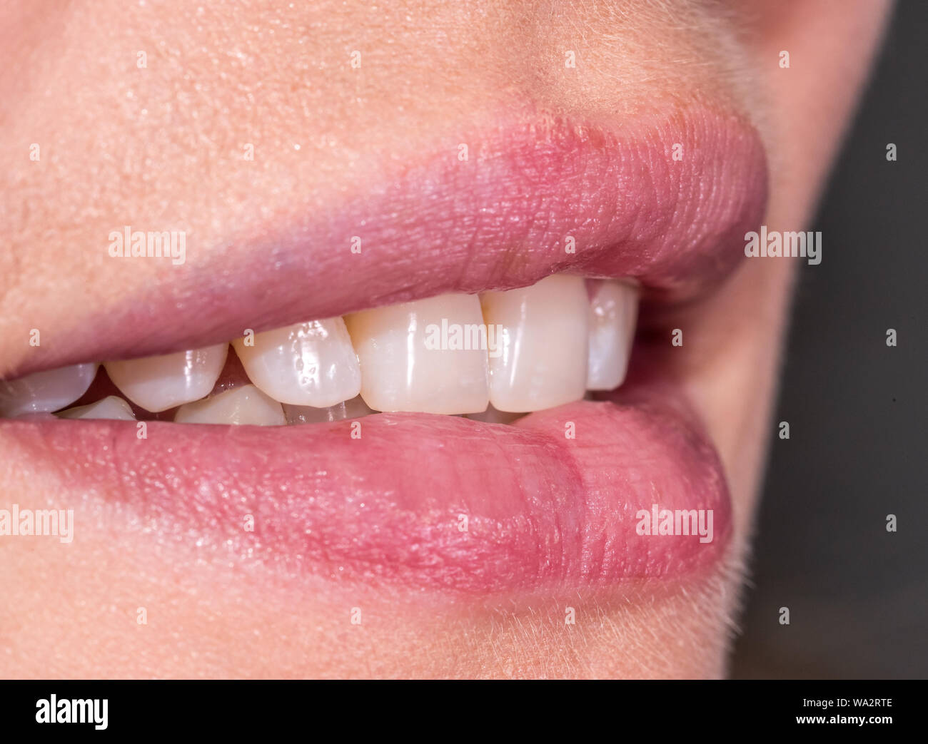 Woman smile with great natural teeth Stock Photo - Alamy