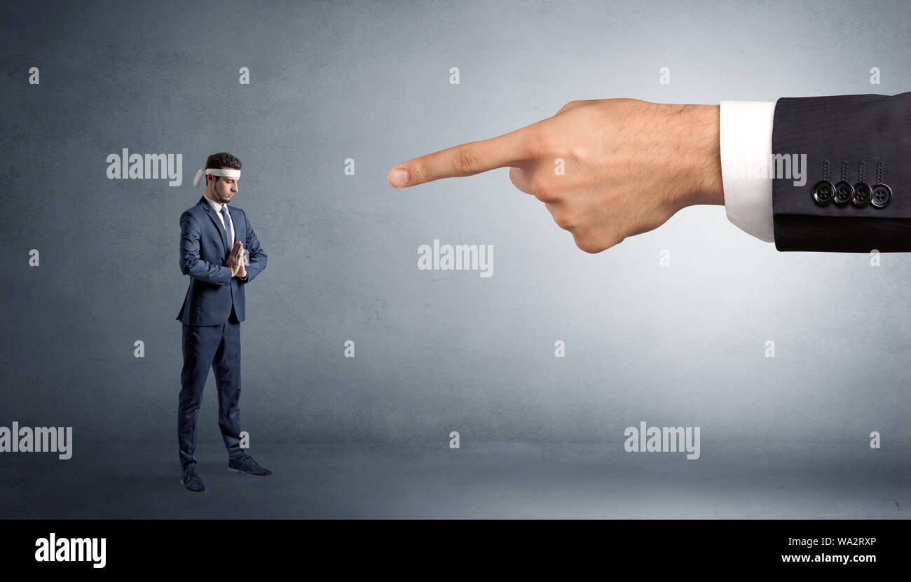 Small karate man fighting with big hand Stock Photo - Alamy