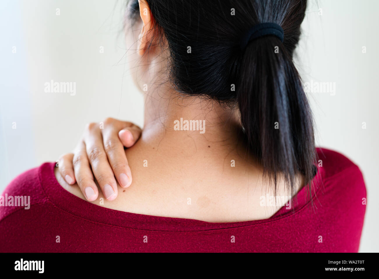 young women neck and shoulder pain injury, healthcare and medical ...