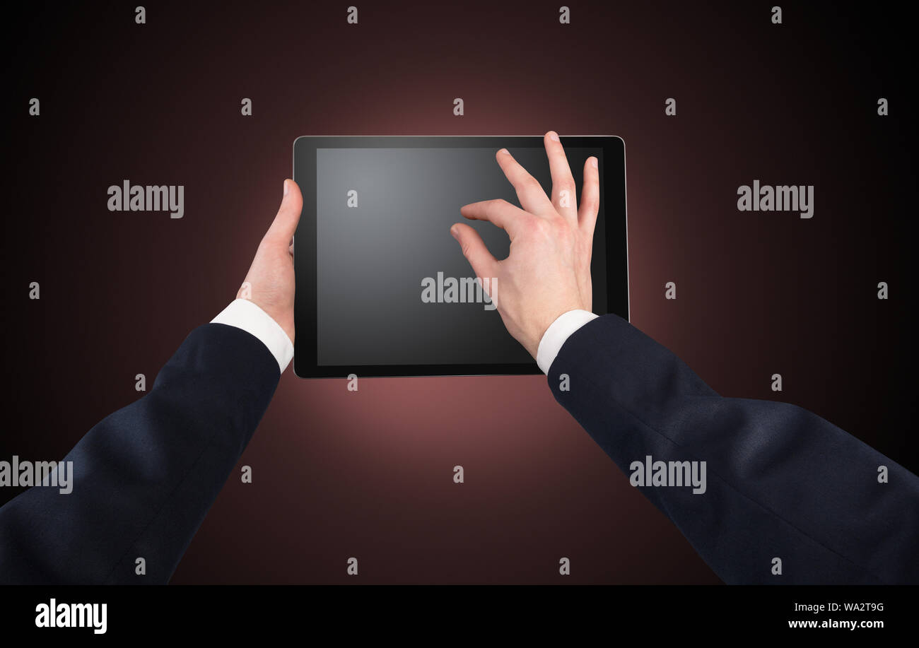 Hand using tablet with no concept and empty space Stock Photo - Alamy