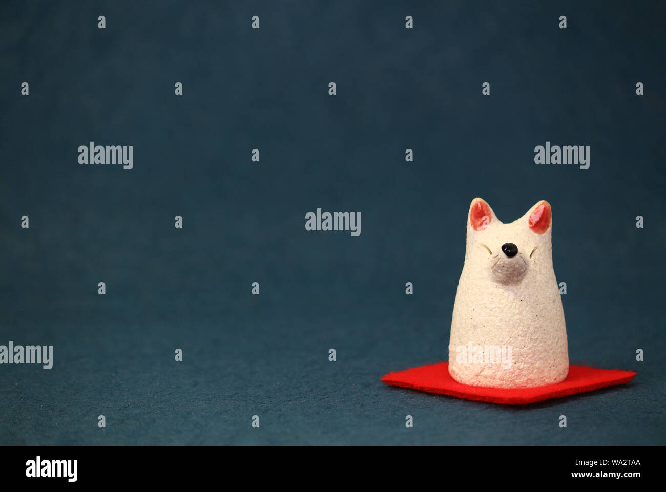Still life photo of Japanese white fox figurine Stock Photo - Alamy