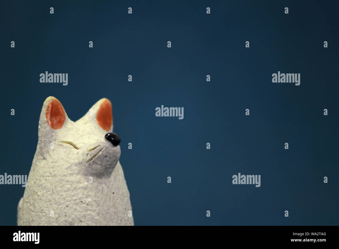 Still life photo of Japanese white fox figurine Stock Photo - Alamy