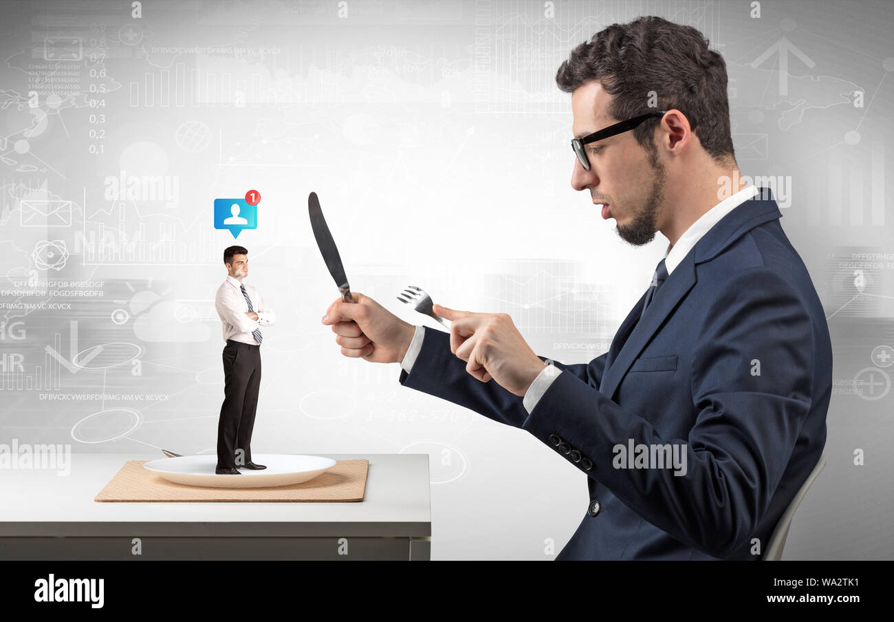 Giant businessman eating small man with financial background Stock ...