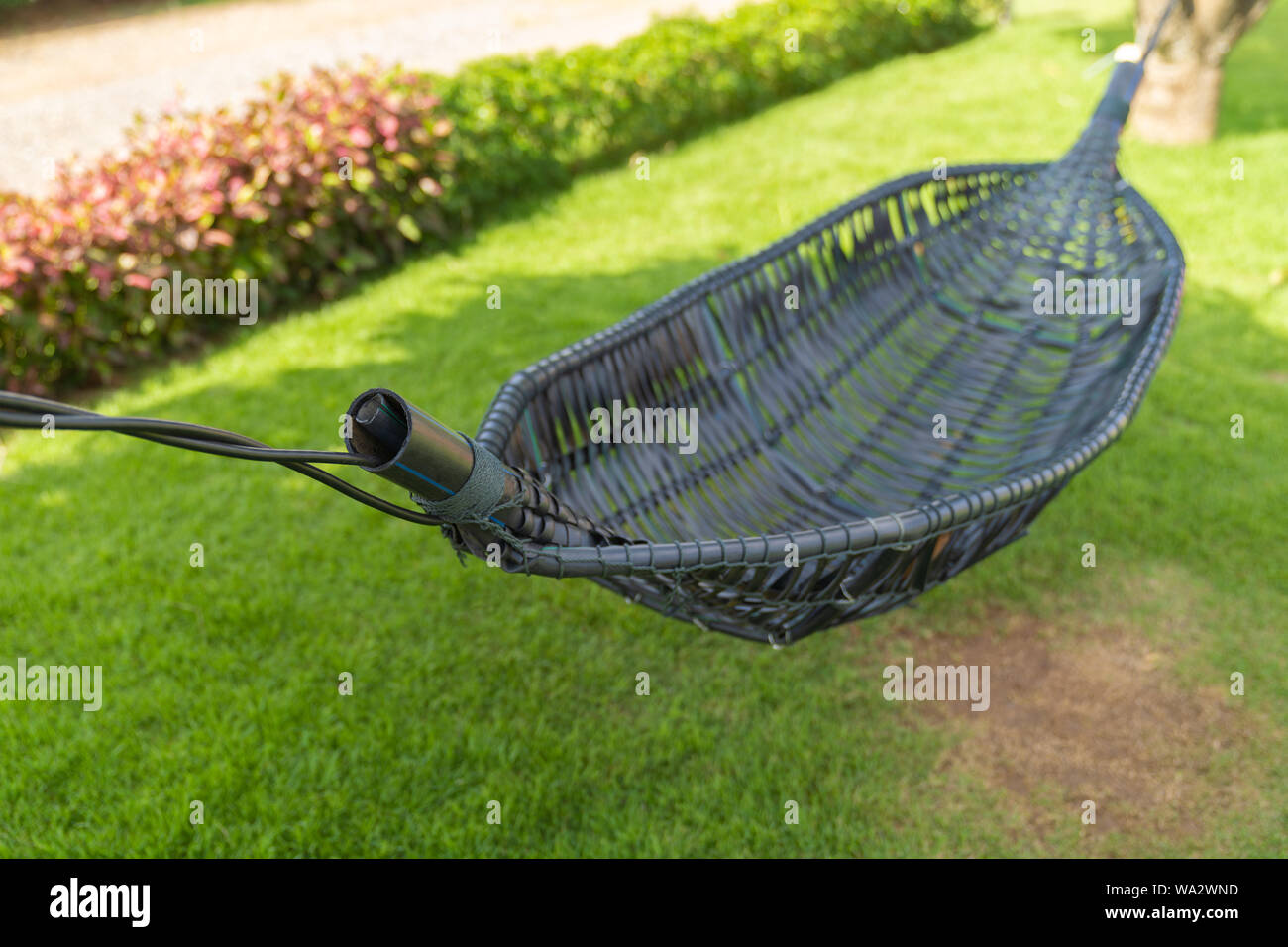 Close up, Black Cradle modern in the garden background Stock Photo - Alamy