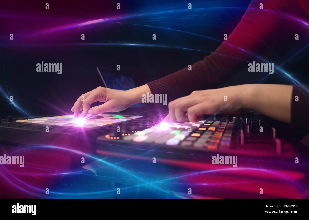 Hand mixing music on midi controller with wave vibe concept Stock Photo ...