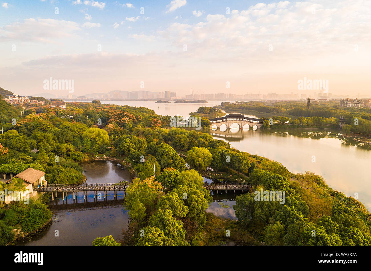 Taihu lake wetland park and urban landscape Stock Photo - Alamy