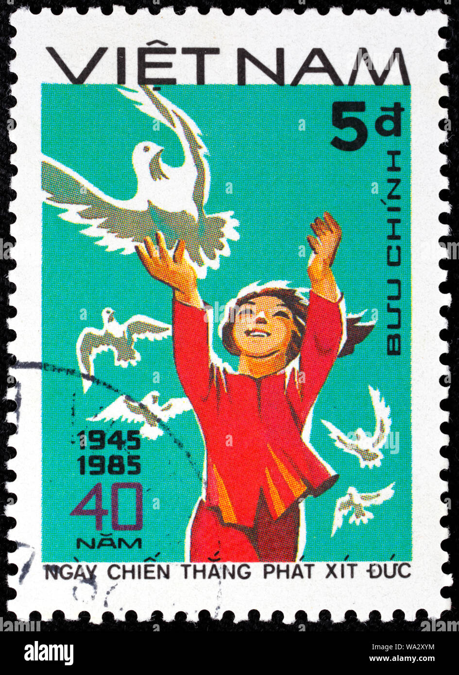 Girl, pigeon, peace, postage stamp, Vietnam, 1985 Stock Photo - Alamy