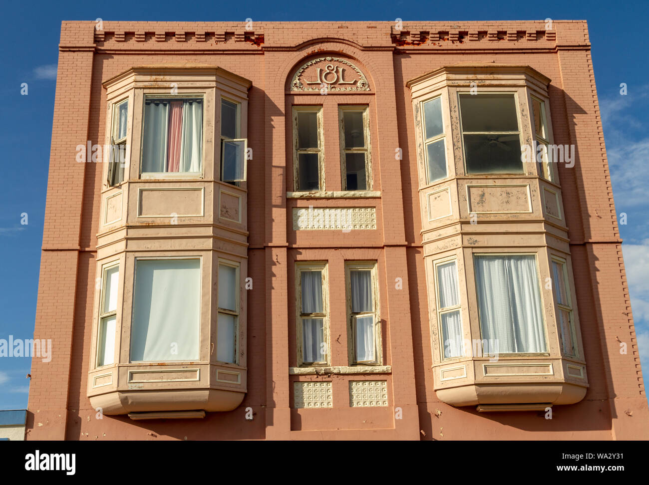 A pink brick building in Last Chance Gulch, Downtown Helena, Montana ...