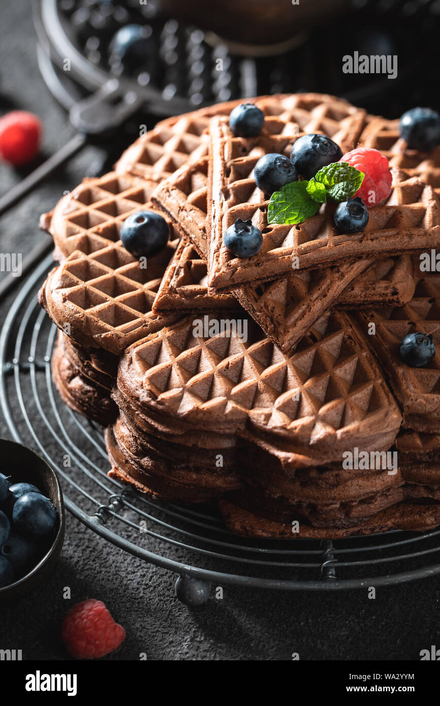 Closeup of fresh waffles made of cocoa with fresh berries Stock Photo ...