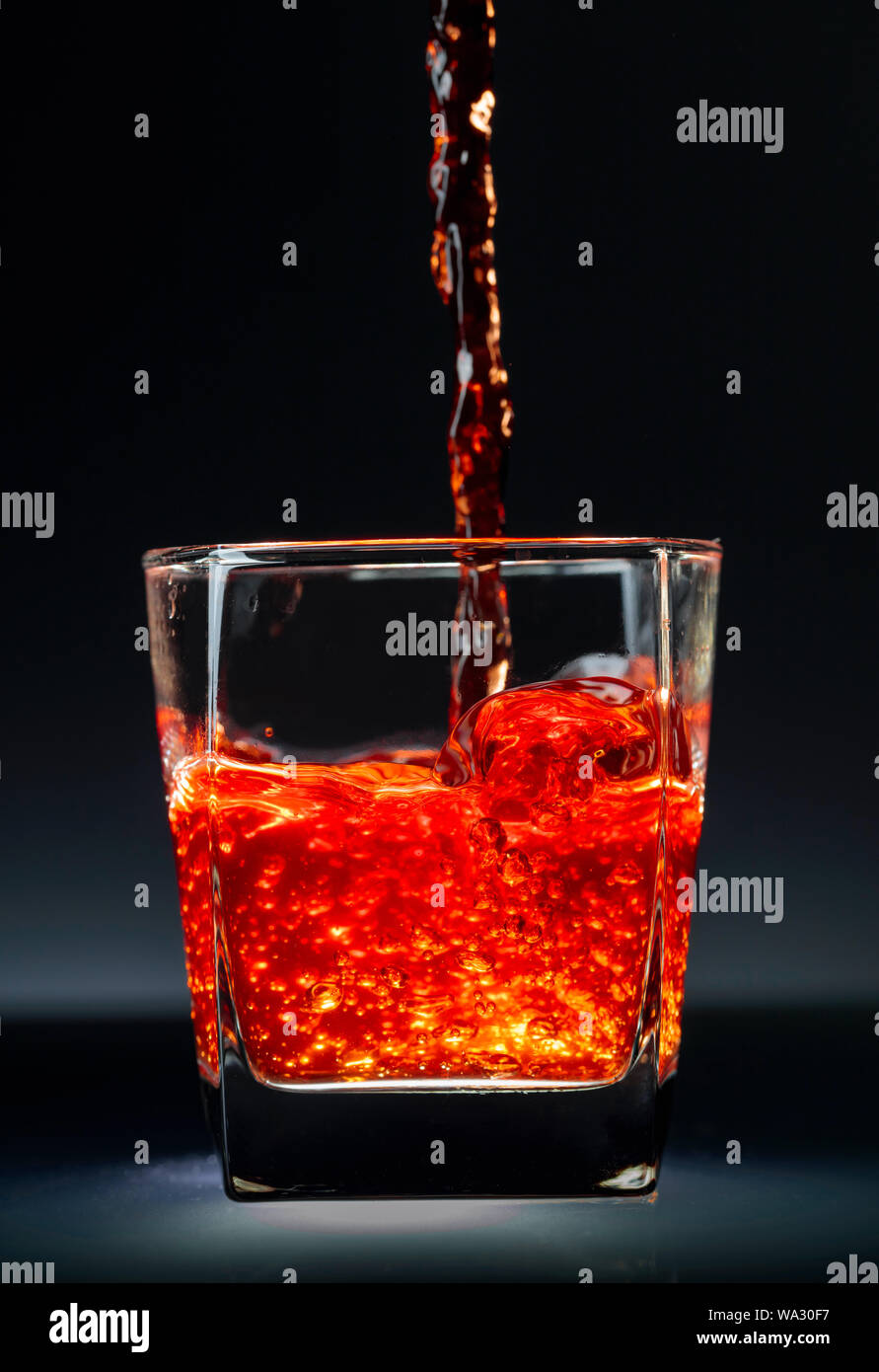 Pouring glass of scotch whisky hi-res stock photography and images - Alamy