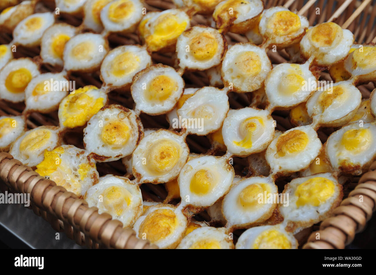 Roasted quail egg clusters Stock Photo - Alamy