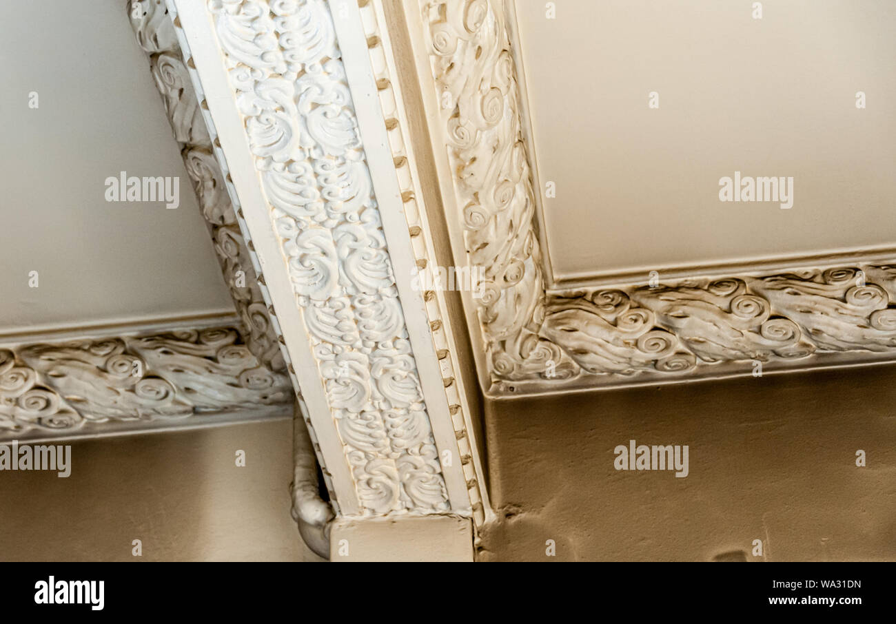 Stucco decorations revealed during renovation Stock Photo - Alamy