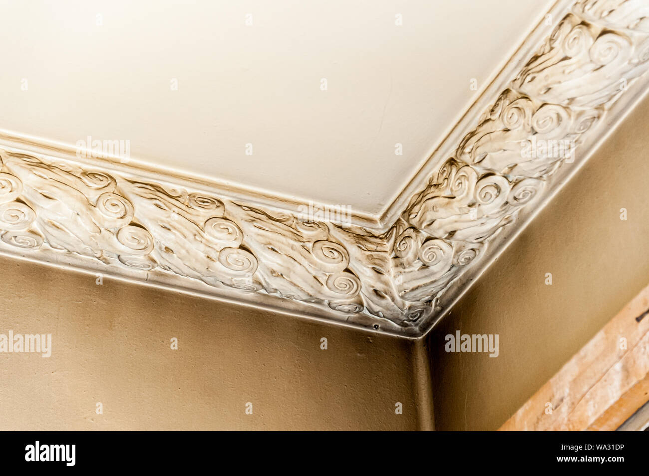 Stucco decorations revealed during renovation Stock Photo - Alamy
