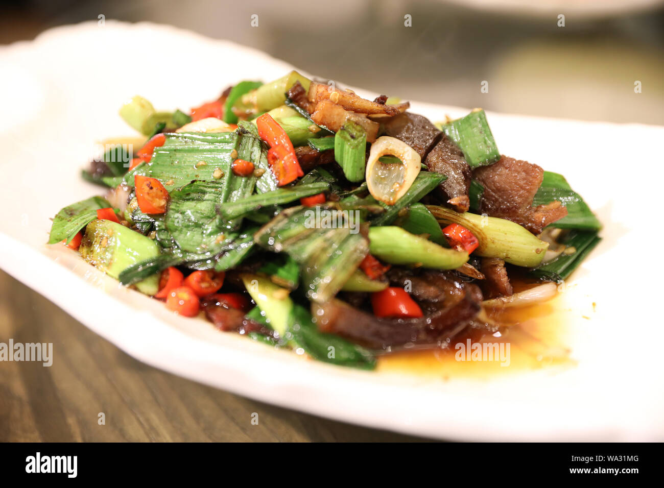 Bacon fry garlic sprout Stock Photo - Alamy