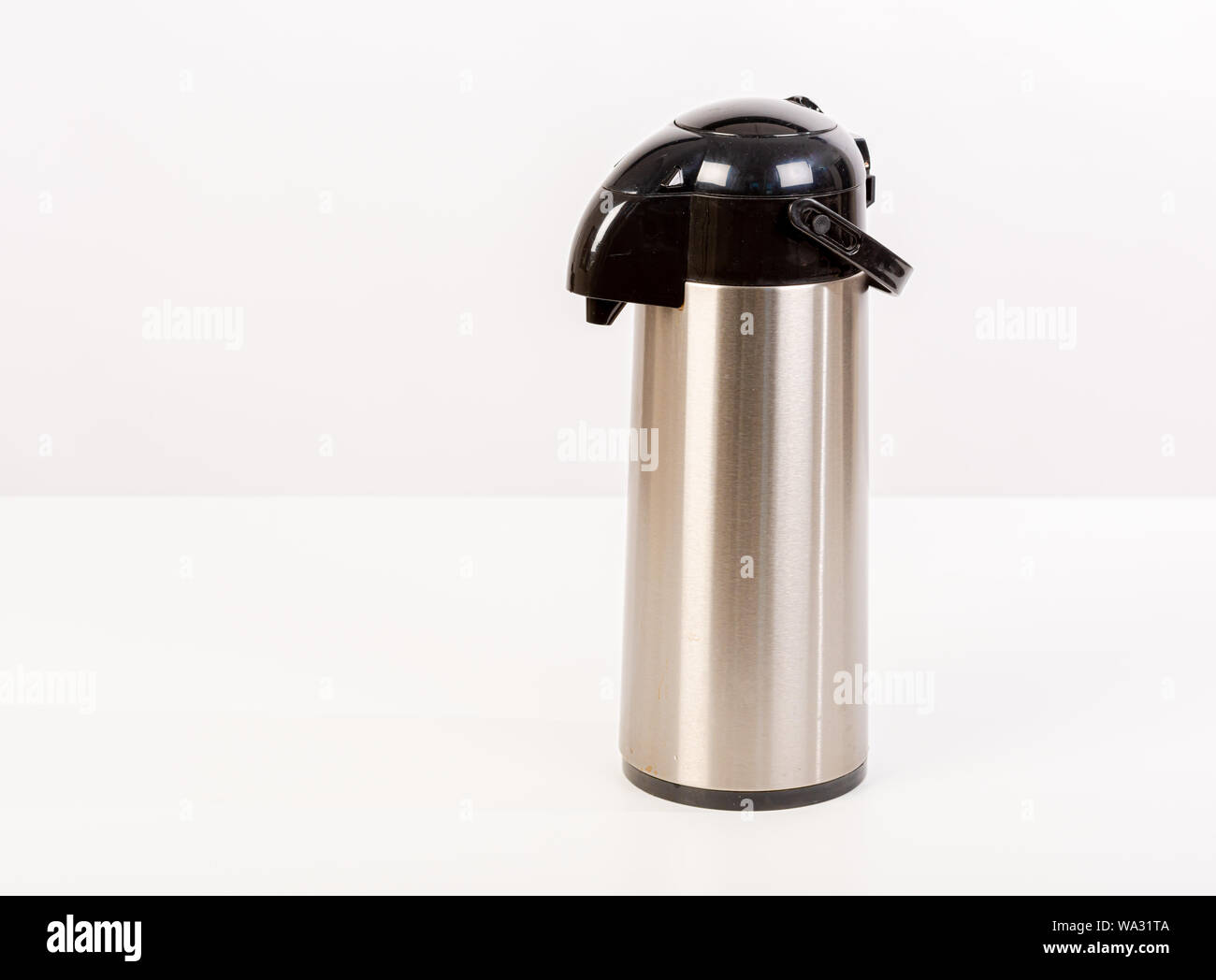 Insulated pump pot for hot liquids like coffe or tea Stock Photo - Alamy