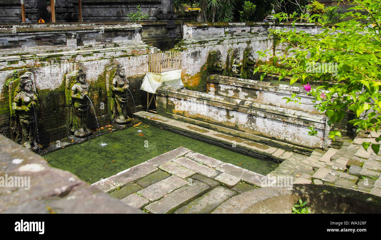 Holy spring water in Tirta Empul temple in Bali Indonesia Stock Photo ...