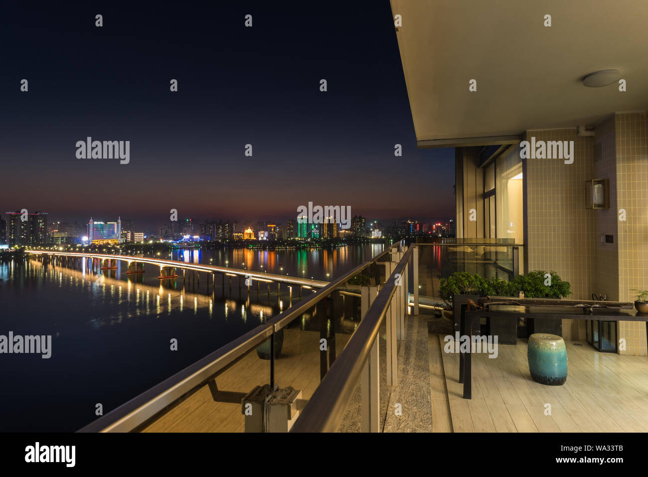 Man glass balcony reflection hi-res stock photography and images - Alamy