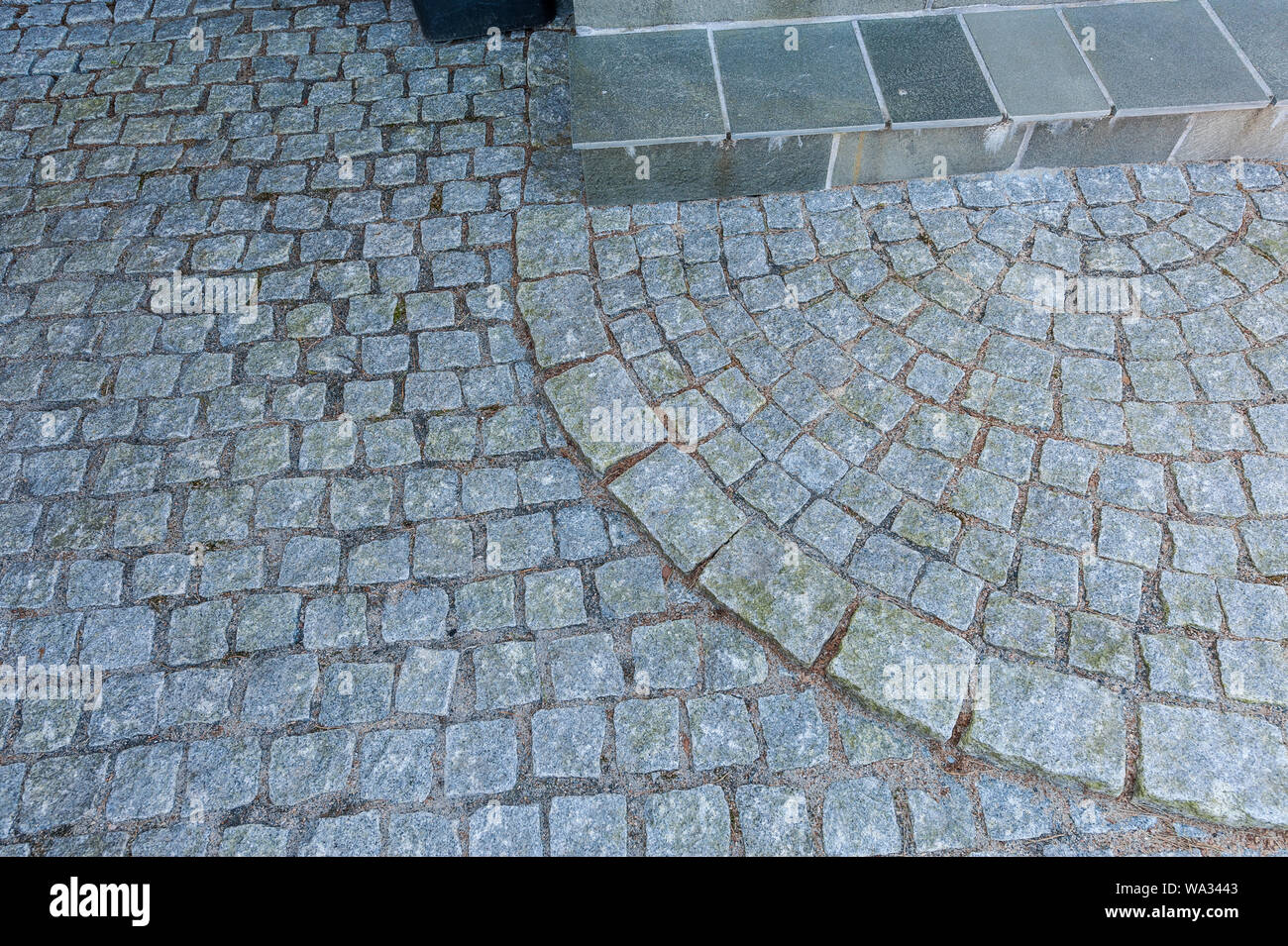 Cobblestone set in a circular pattern Stock Photo - Alamy