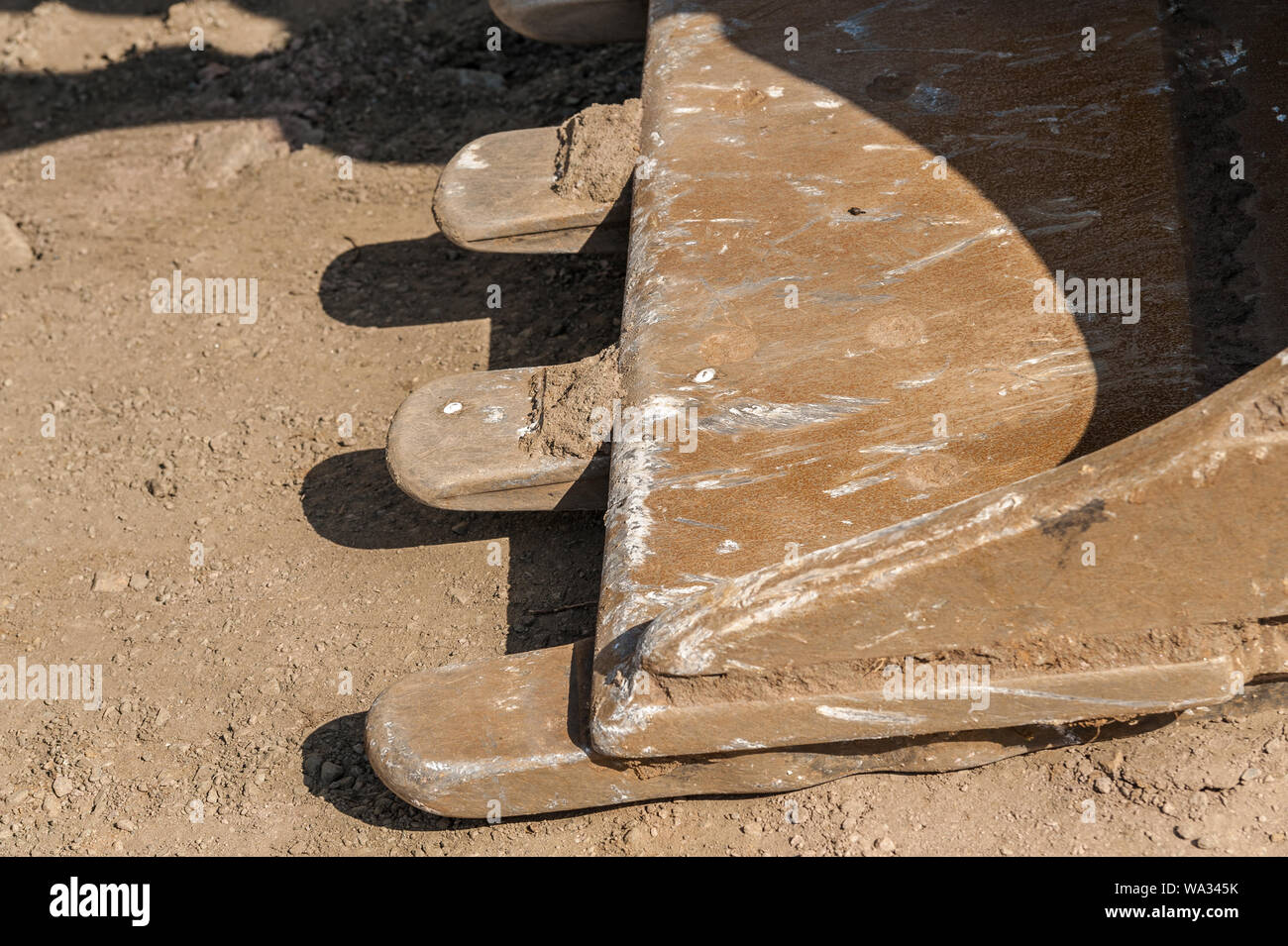 Bucket and teeth of an excavator Stock Photo - Alamy