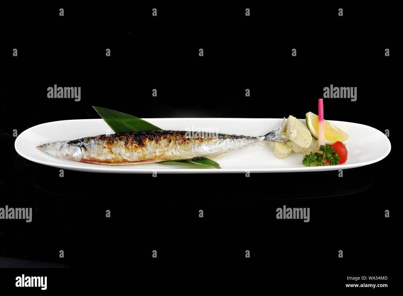Japanese cuisine roast mackerel pike Stock Photo - Alamy
