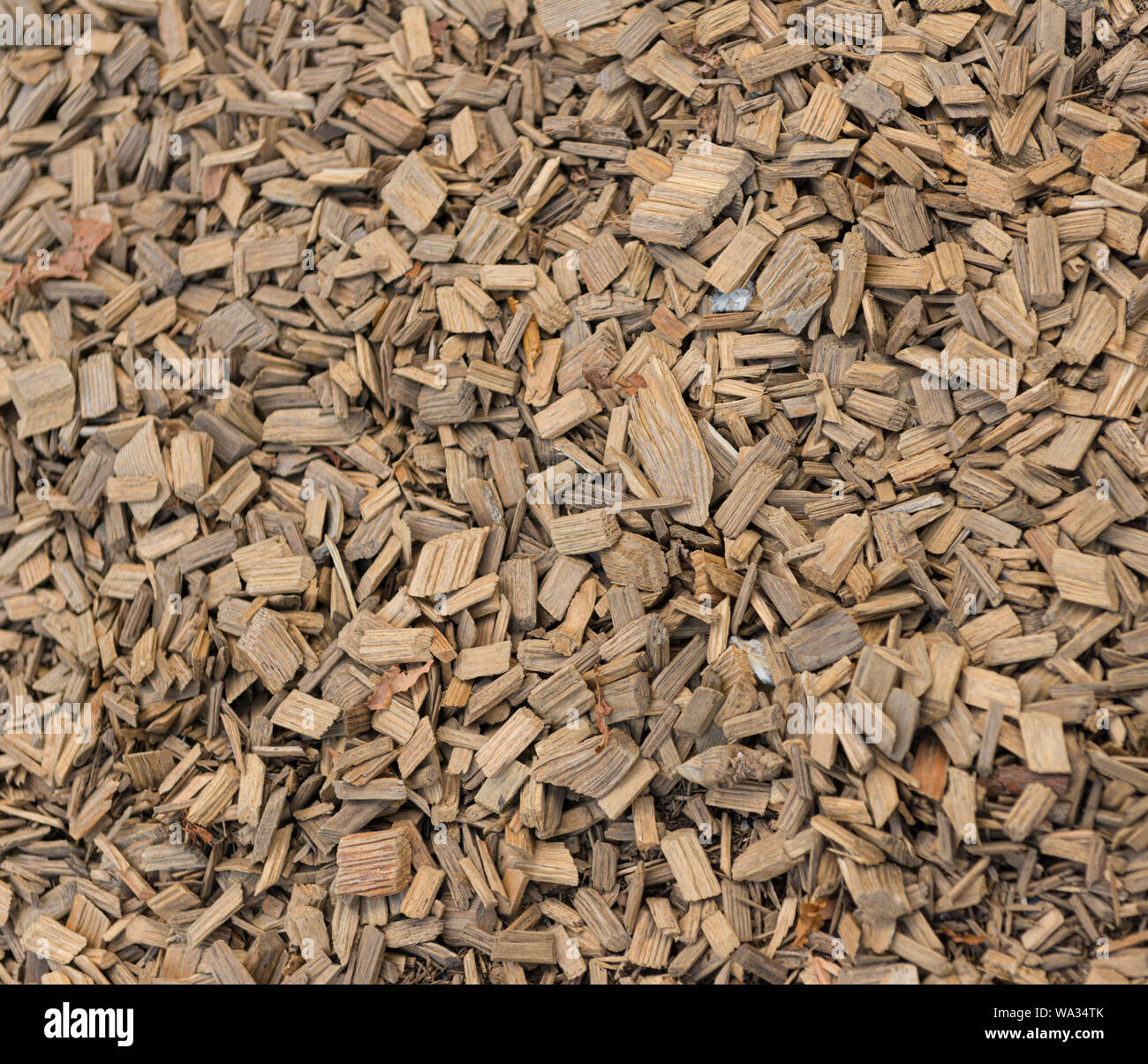 Large pile of dry wood chips Stock Photo - Alamy