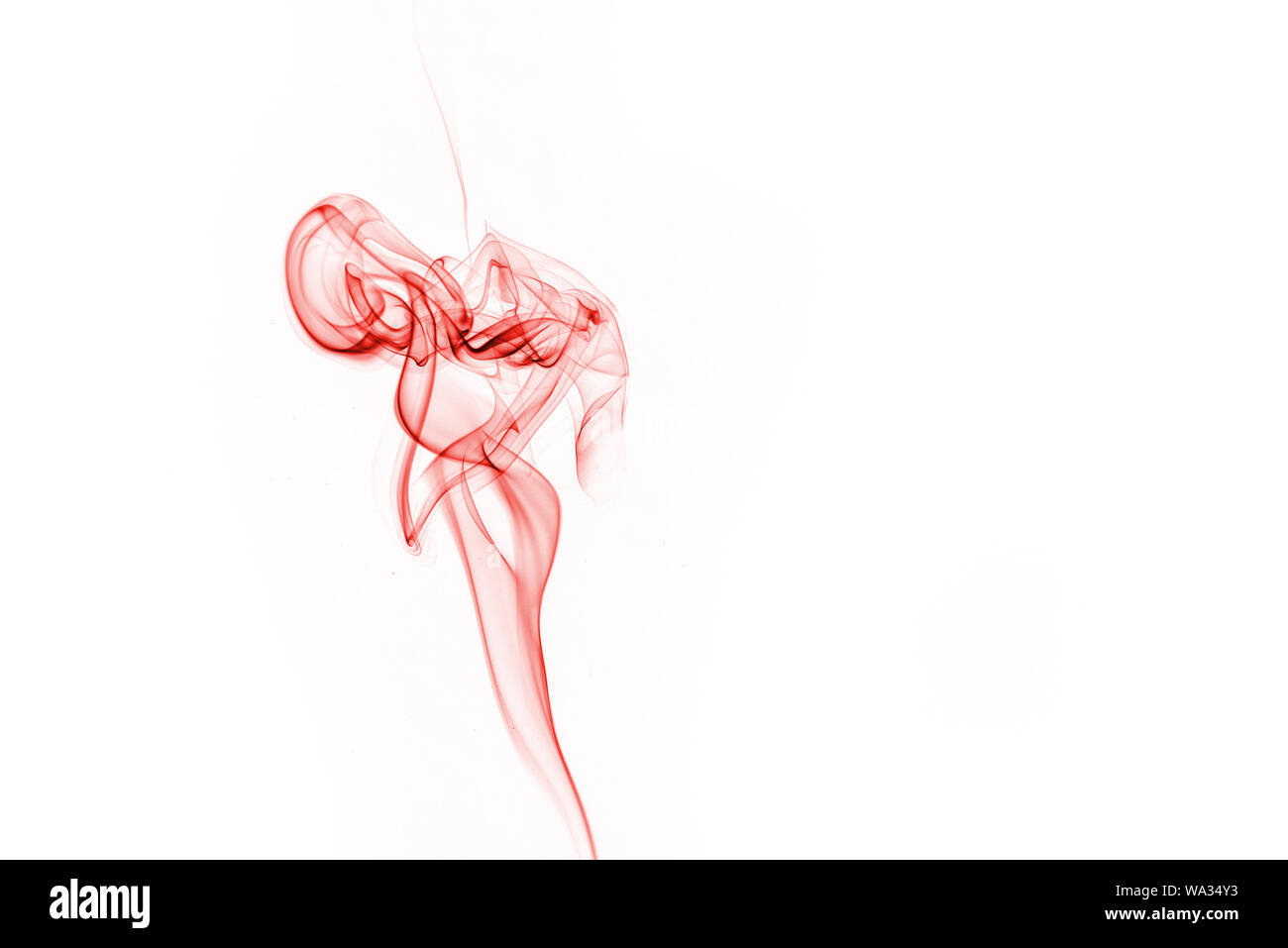 Red smoke on white background Stock Photo - Alamy