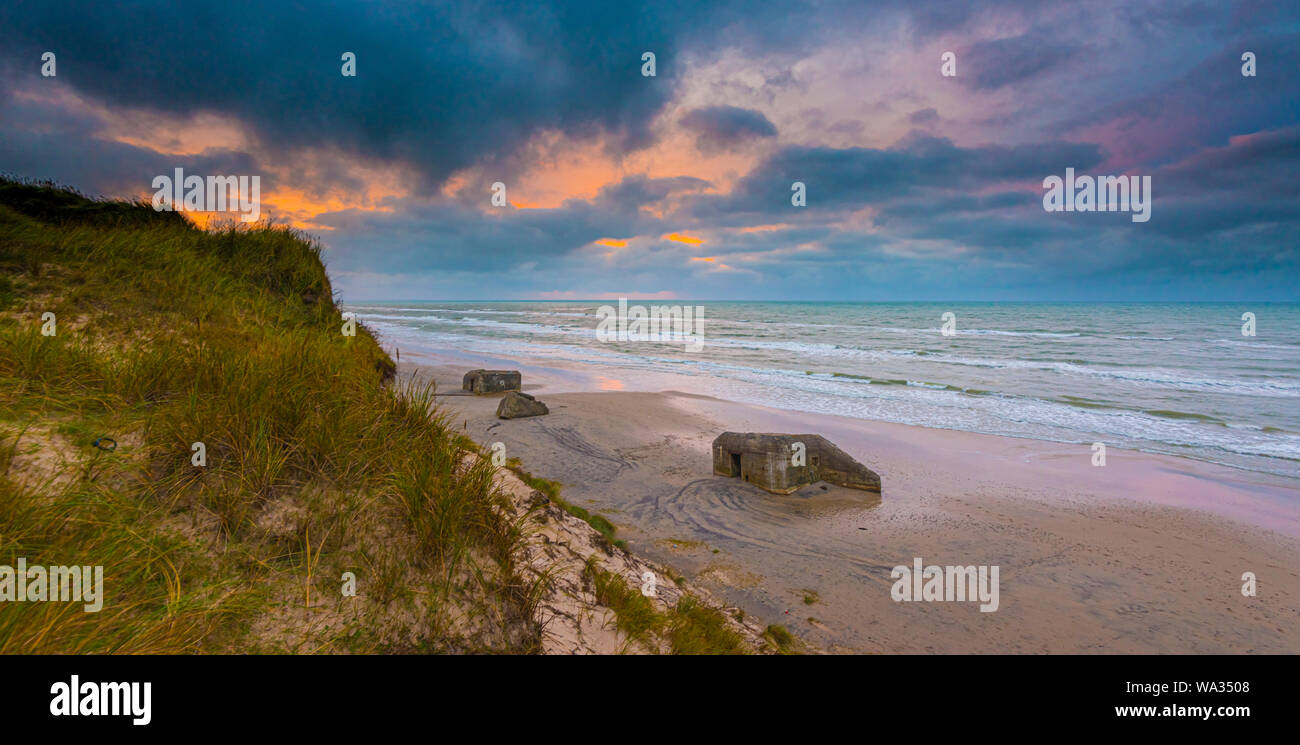 Long exposure of old bunker fortifications on a sandy beach Stock Photo ...