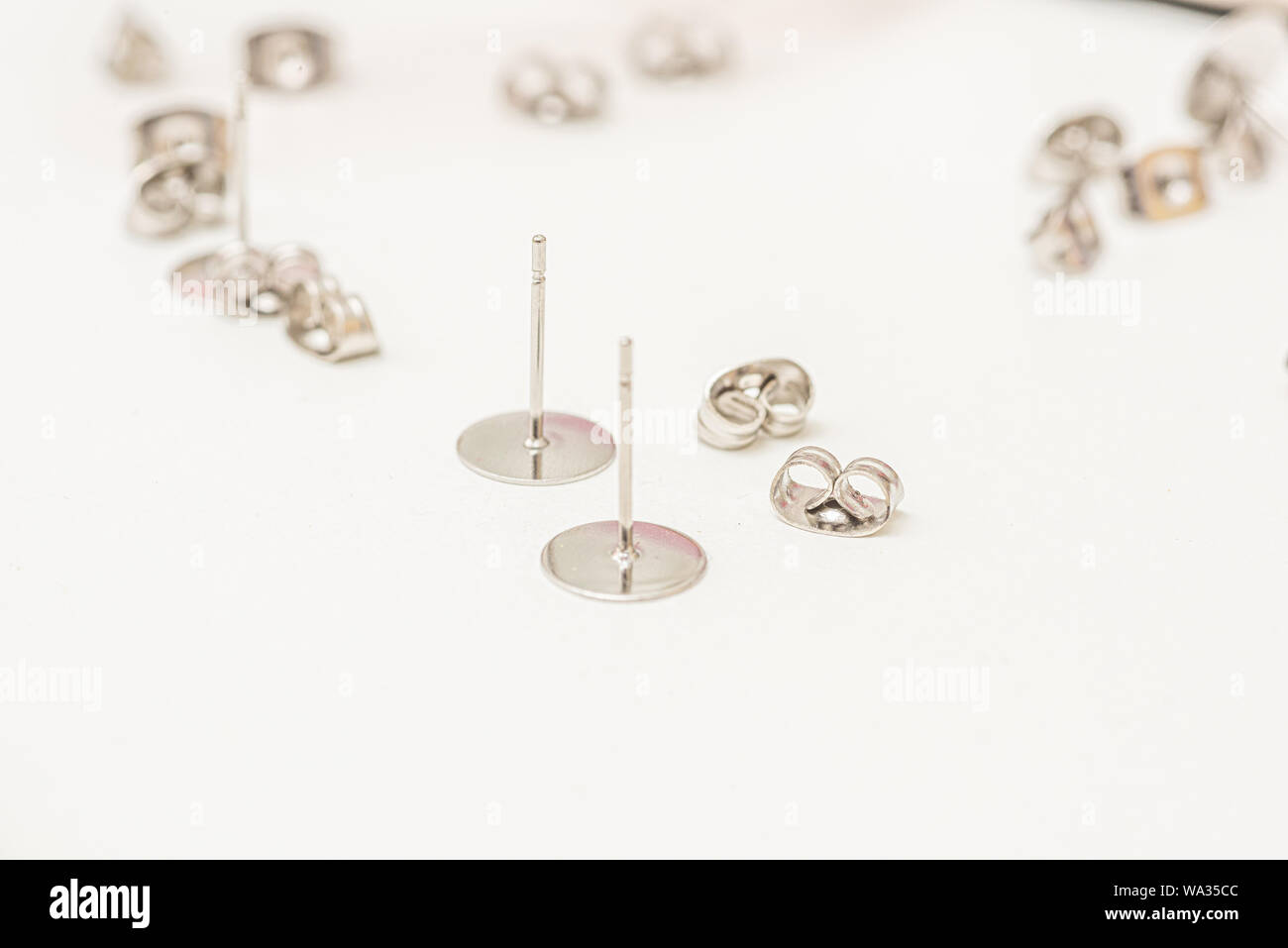 Ear studs hi-res stock photography and images - Alamy