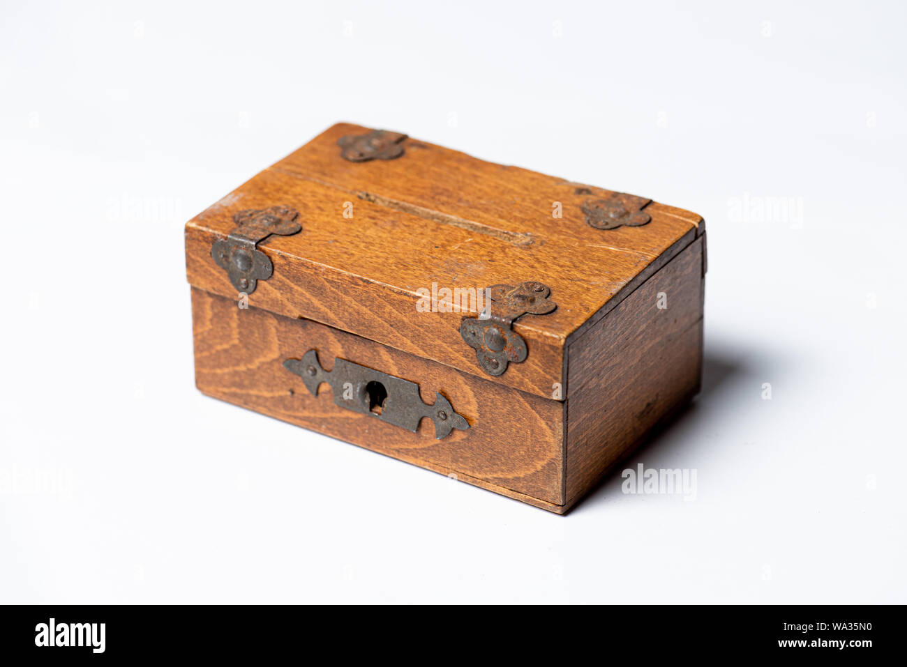 Vintage handmade wooden box with lock on white background Stock Photo ...