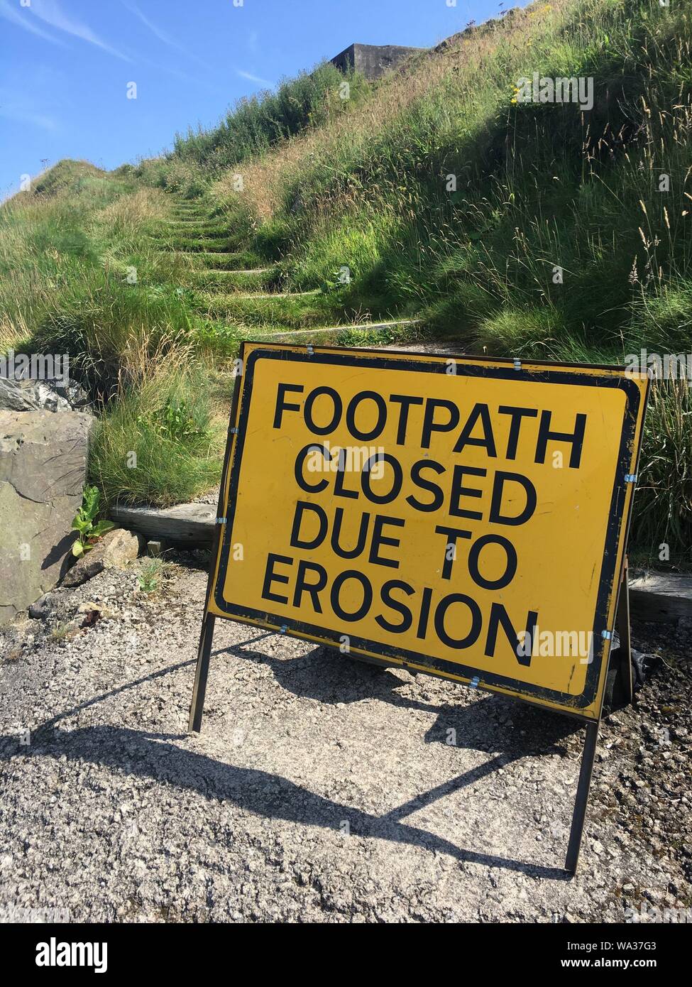 Footpath closed due to erosion at beach cliff Stock Photo - Alamy