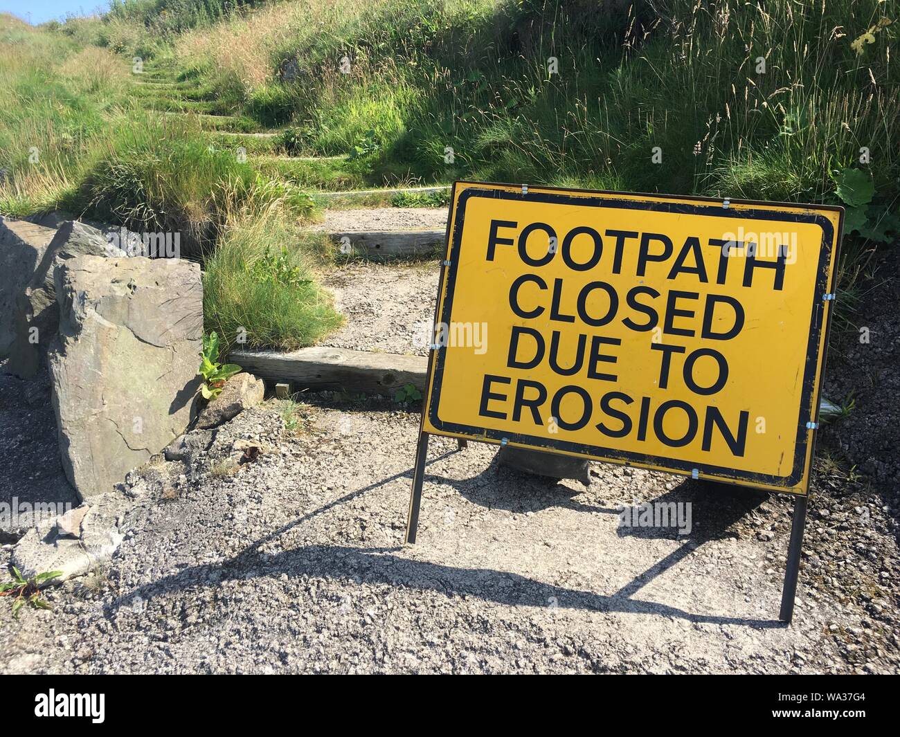 Footpath closed due to erosion at beach cliff Stock Photo - Alamy