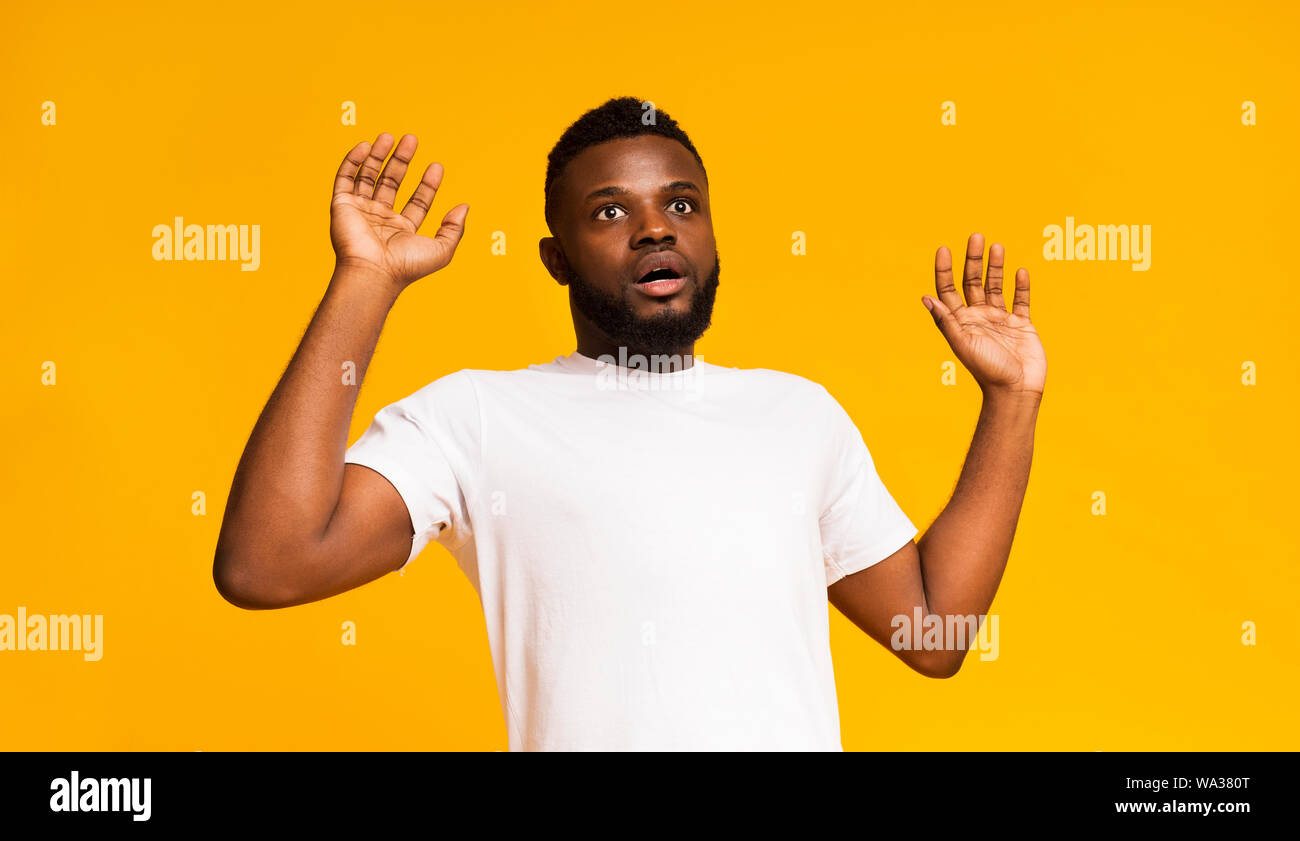 Emotional surprised bearded man standing with open mouth Stock Photo ...