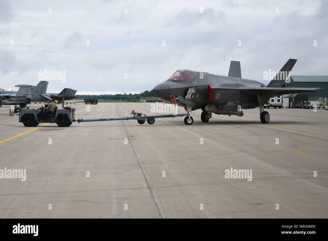 U.S. Air Force Airmen assigned to the 33rd Fighter Wing tow an F-35A ...