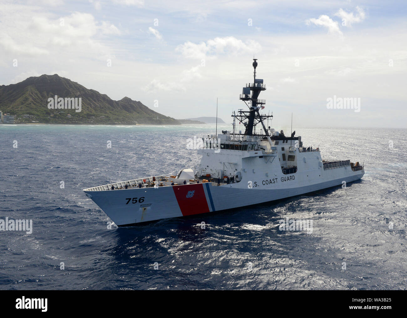 The crew of the Coast Guard Cutter Kimball (WMSL 756) tranists past ...