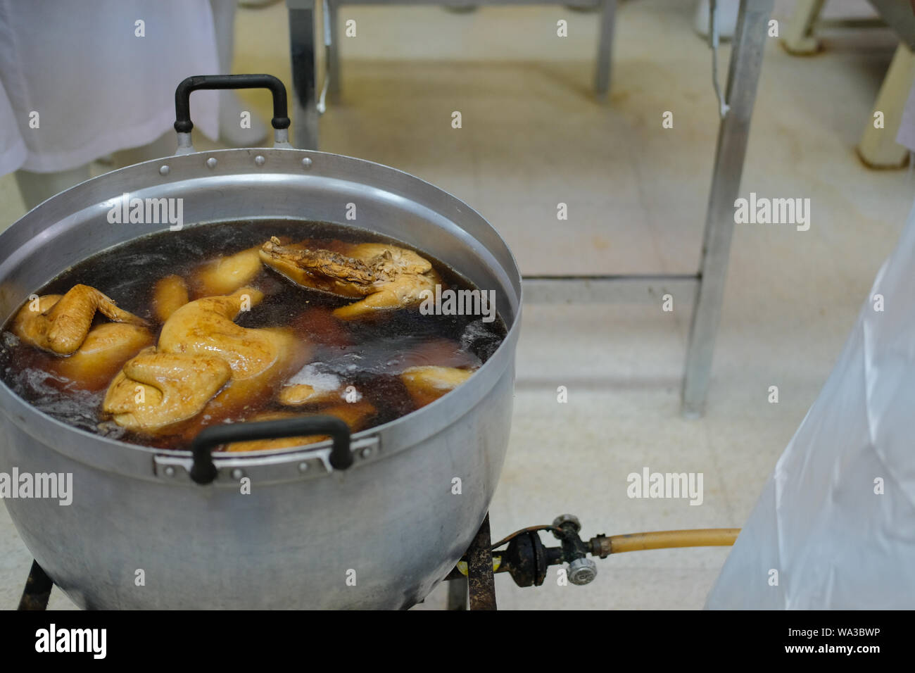 chicken boiling in fish sauce soup. boiled braised chicken Stock Photo ...