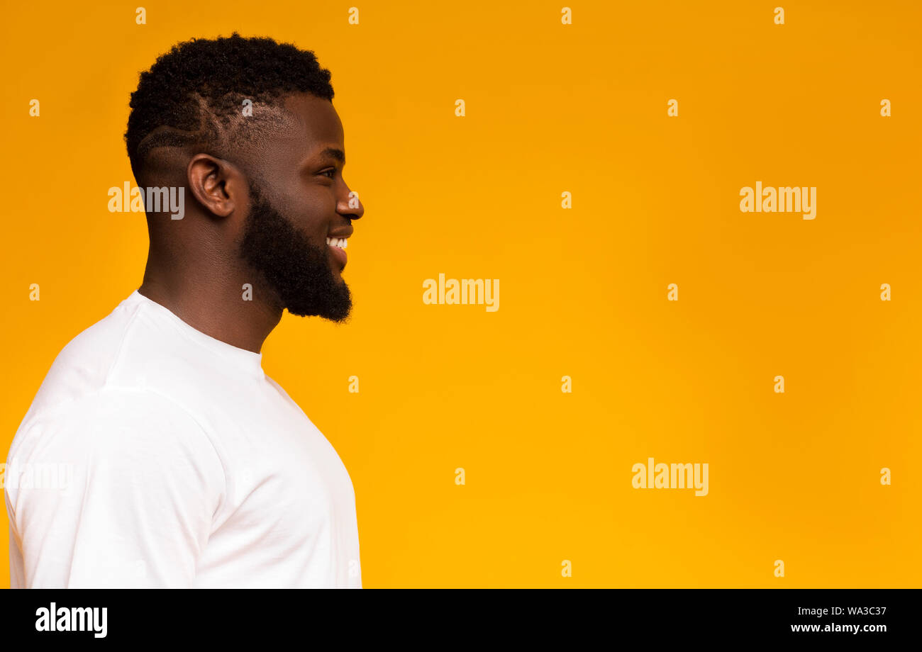 Happy smiling young african american man profile portrait Stock Photo ...