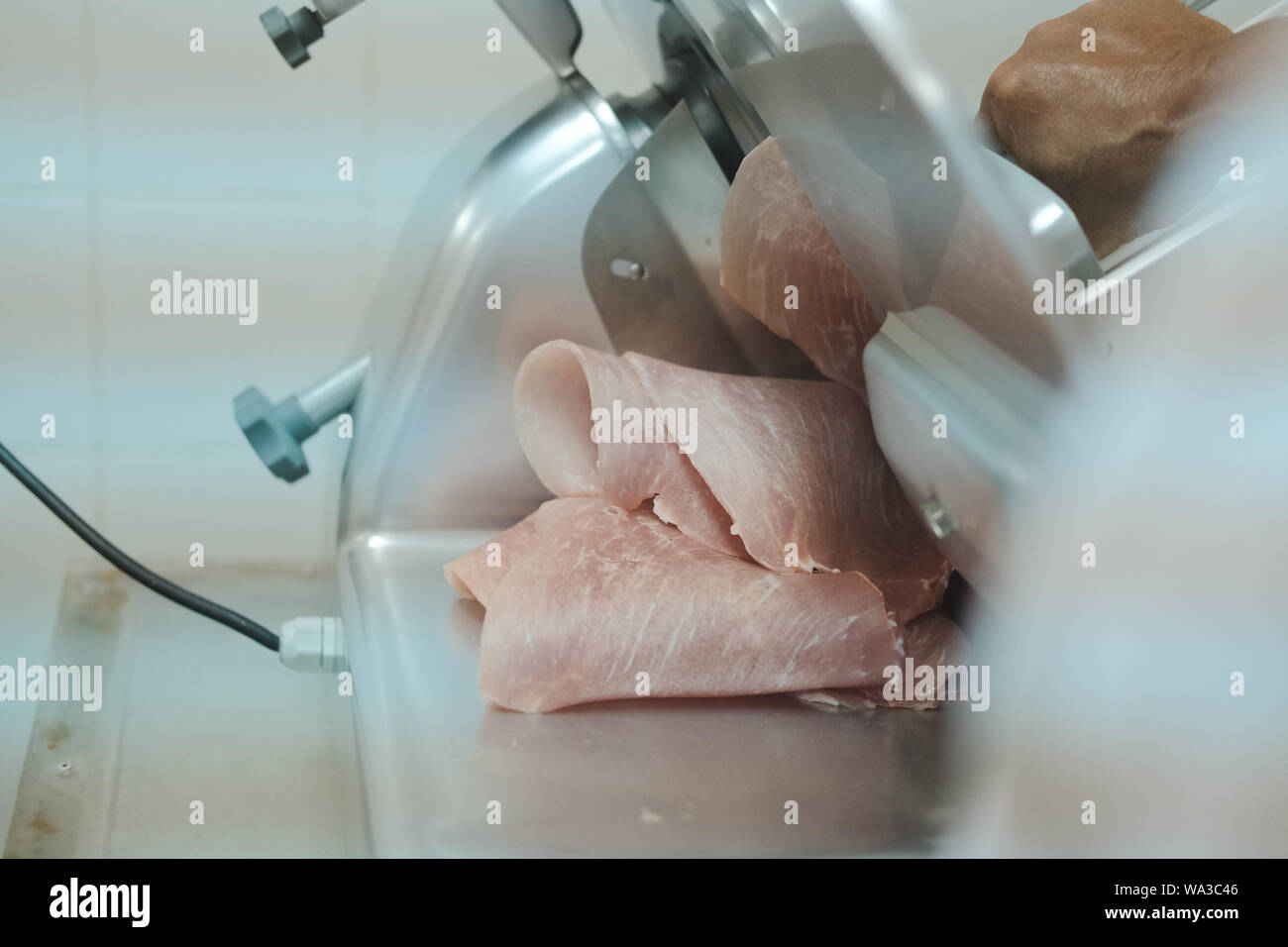 meat cutting slicing machine in food processing factory industry Stock ...