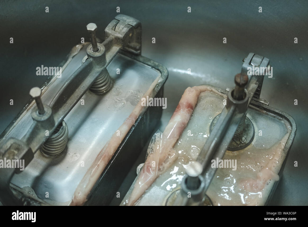 ham making machine in meat processing plant. food industry Stock Photo ...