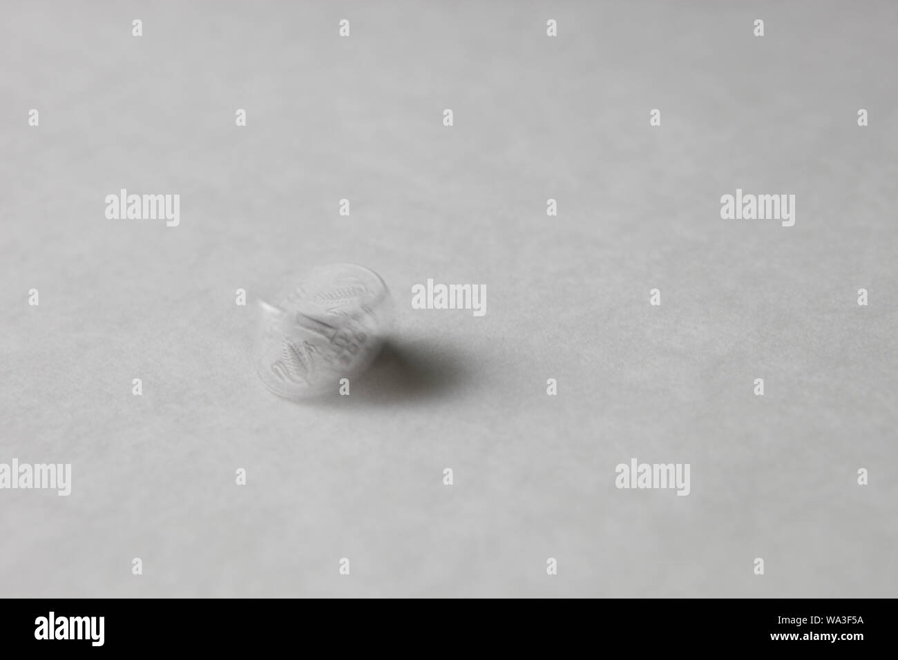 Indian one rupee coin spinning Stock Photo - Alamy