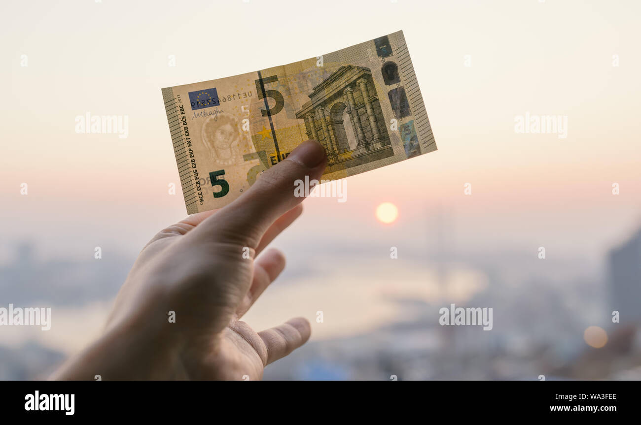 Giving hand euros hi-res stock photography and images - Alamy