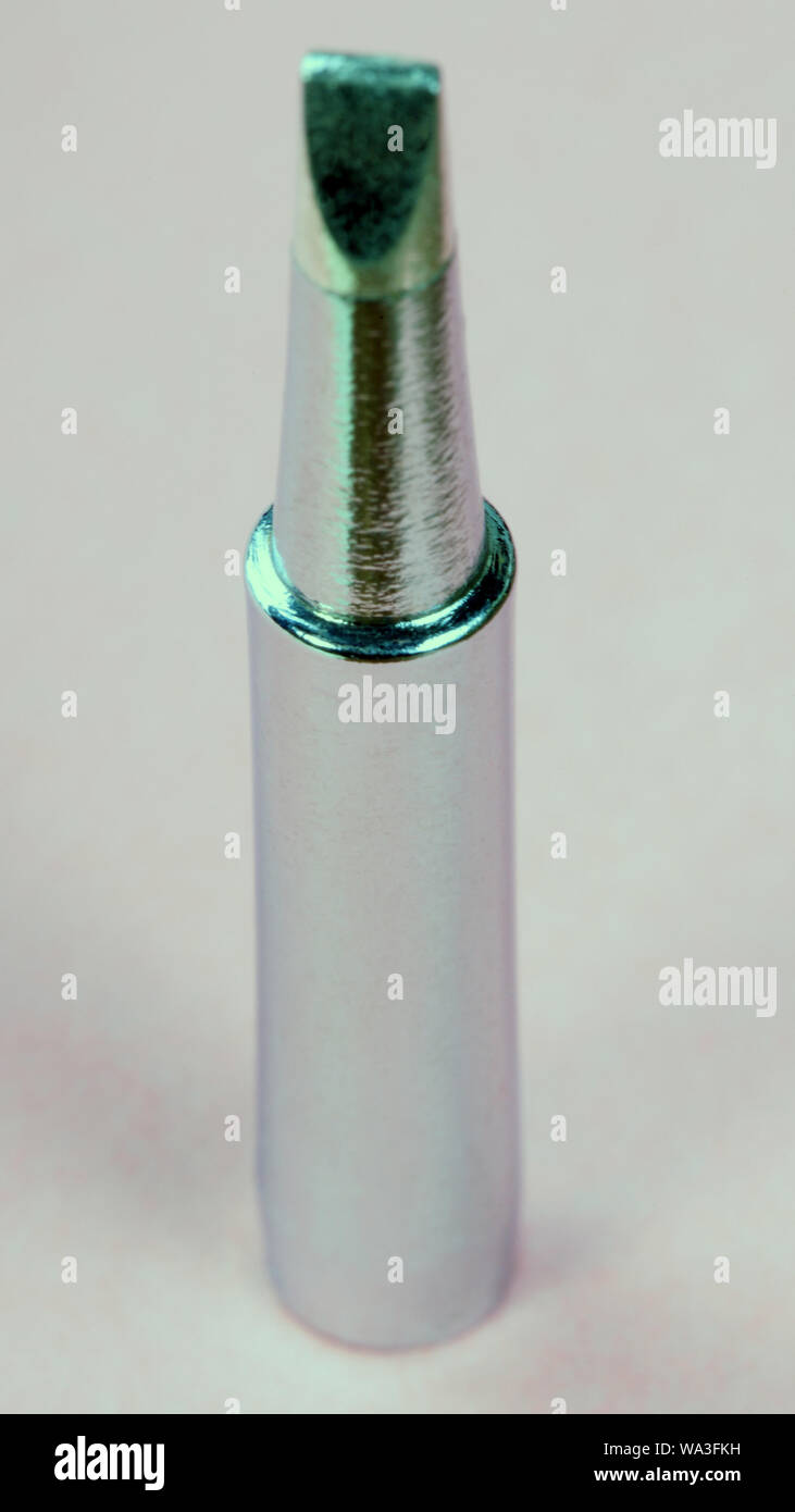 Soldering tips on pink background Stock Photo - Alamy