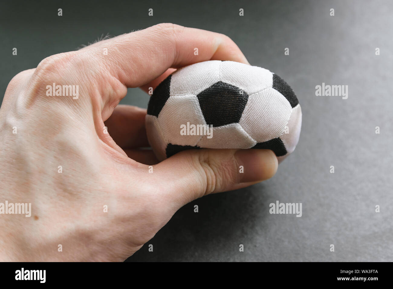 Hand squeezing ball hi-res stock photography and images - Alamy