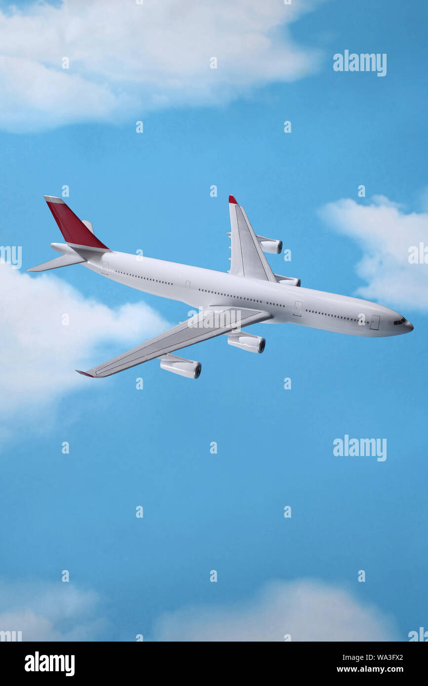 The plane flew in the sky Stock Photo - Alamy