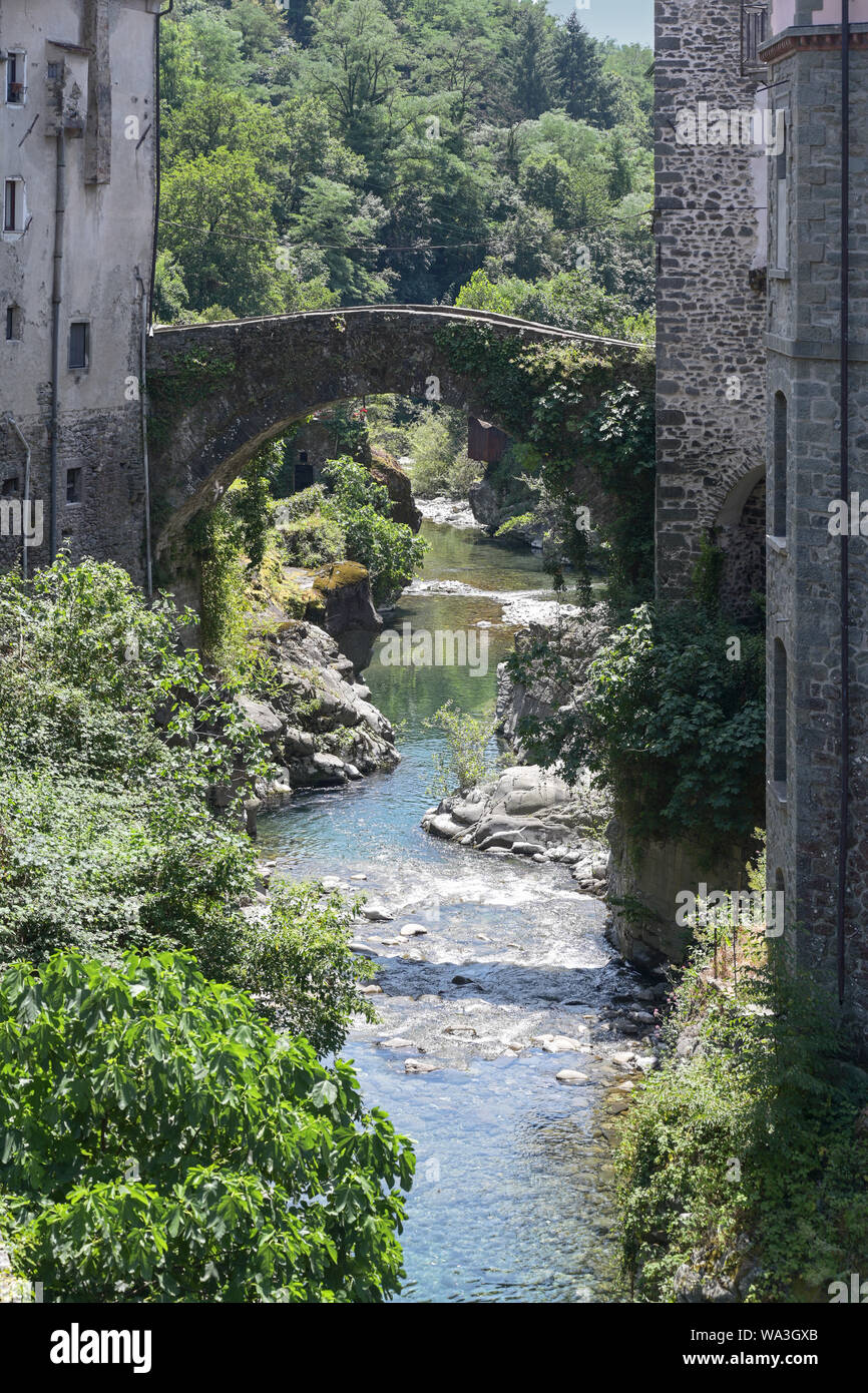 Magra River with the ancient bridge in Bagnone, a small town in Tuscany ...