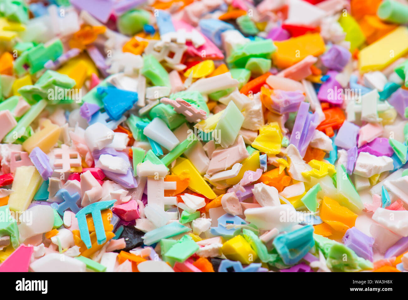 coloured plastic regrind in lab Stock Photo - Alamy